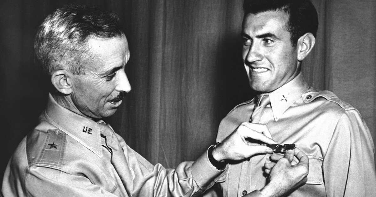 'Unbroken' Olympian and WWII hero Louis Zamperini dies at 97 | LAist