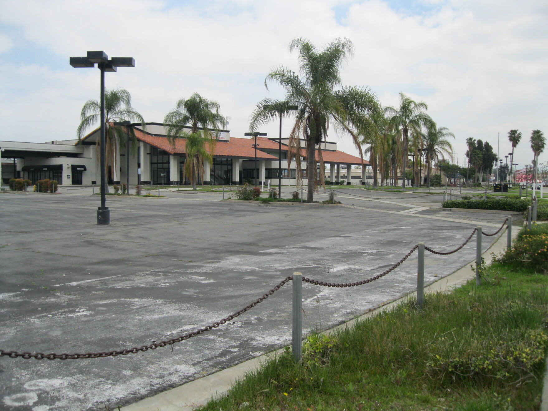 Cities face challenge of empty car dealership lots | LAist