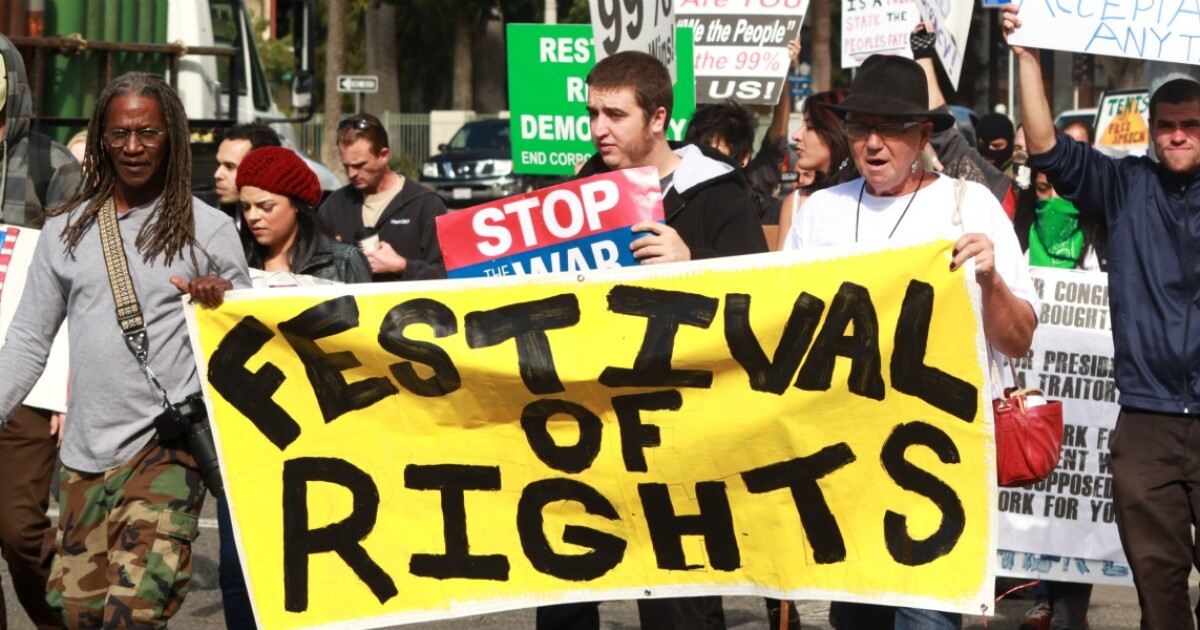 Occupy activists march at Riverside police headquarters | LAist