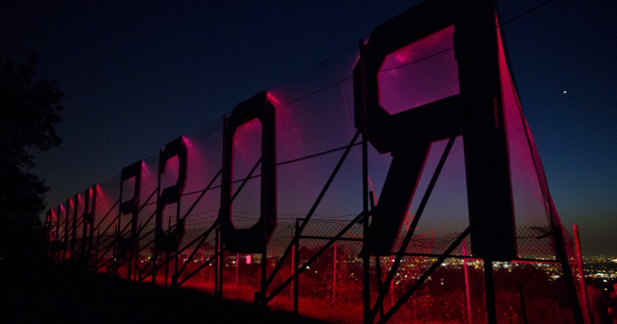 Off-Ramp solves the mystery of Rose Hills Cemetery's giant neon sign ...