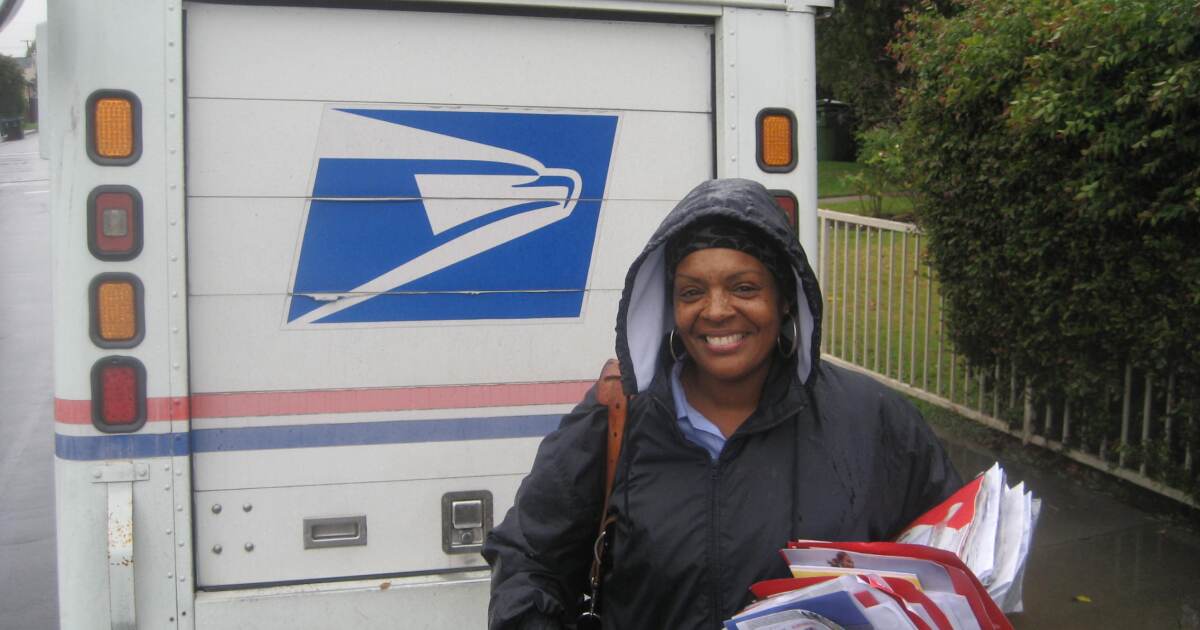 Rain, sleet or snow, it's busy season for Southland postal workers | LAist