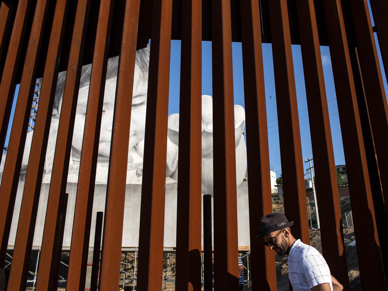 Meet French artist JR, the man behind the border art installation that ...