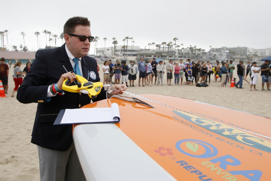 Surf City USA: Guinness World Records surfing title broken in ...